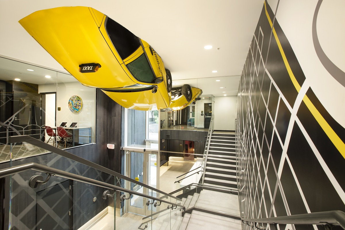 Suspended Taxi Greets Students in Hub Minneapolis' Reception Area ...