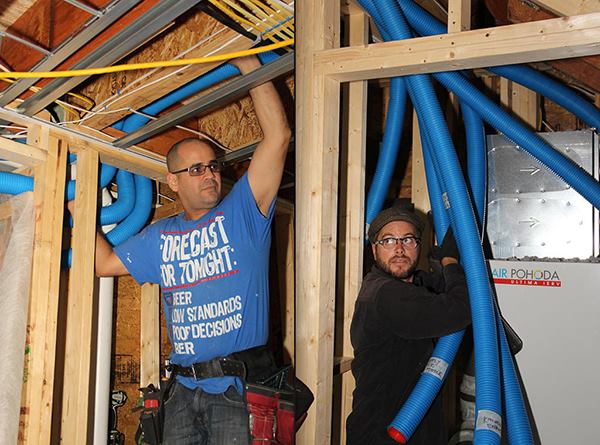 Installing an ERV in a Two-Family Passive House | JLC Online
