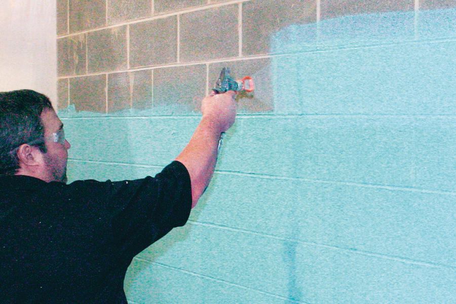 Sam Hagerman seals out air and moisture with a fluid-applied ...